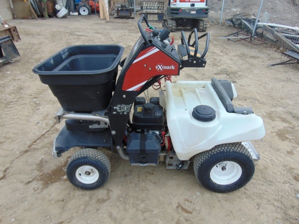 eXmark Stand On Fertilizer Spreader | GRC March Consignments | K-BID