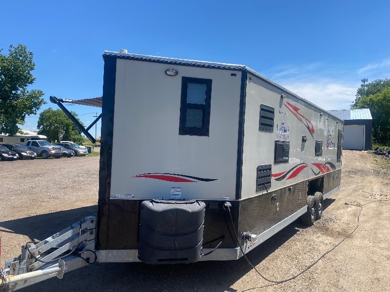 2019 Black Knight Ice Castle 8x28 & 1994 BAJA 33 FT | K-BID