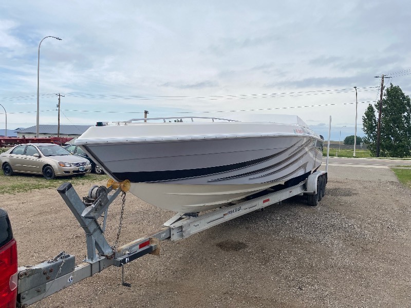 2019 Black Knight Ice Castle 8x28 & 1994 BAJA 33 FT | K-BID